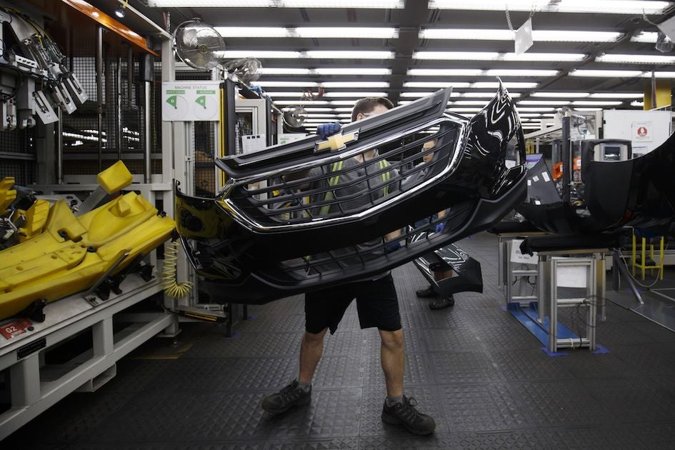 car part worker in car plant | NADA